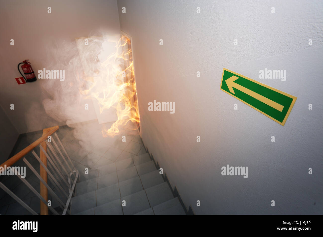 Building on fire - emergency exit Stock Photo - Alamy