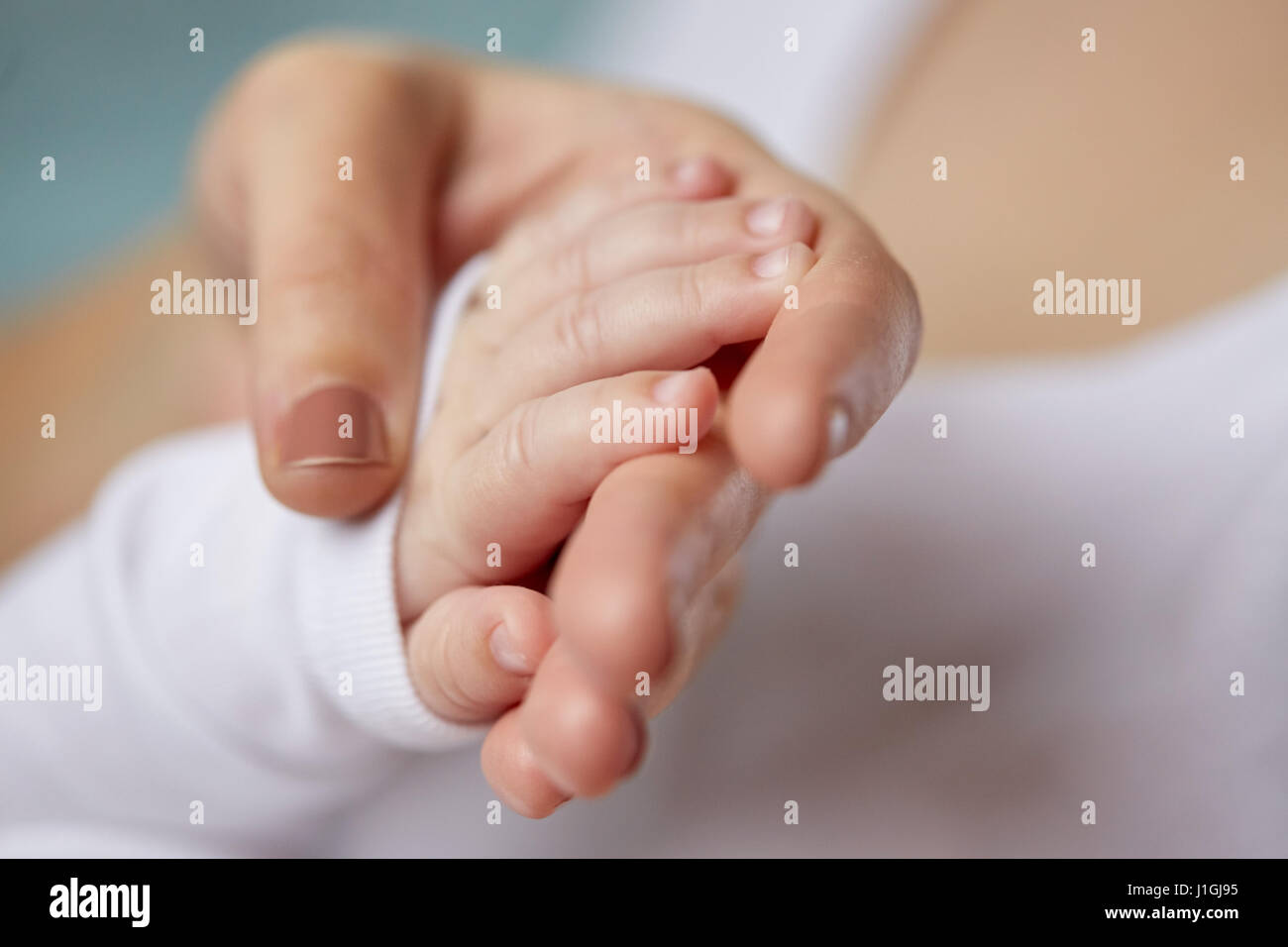 close up of mother and newborn baby hands Stock Photo - Alamy