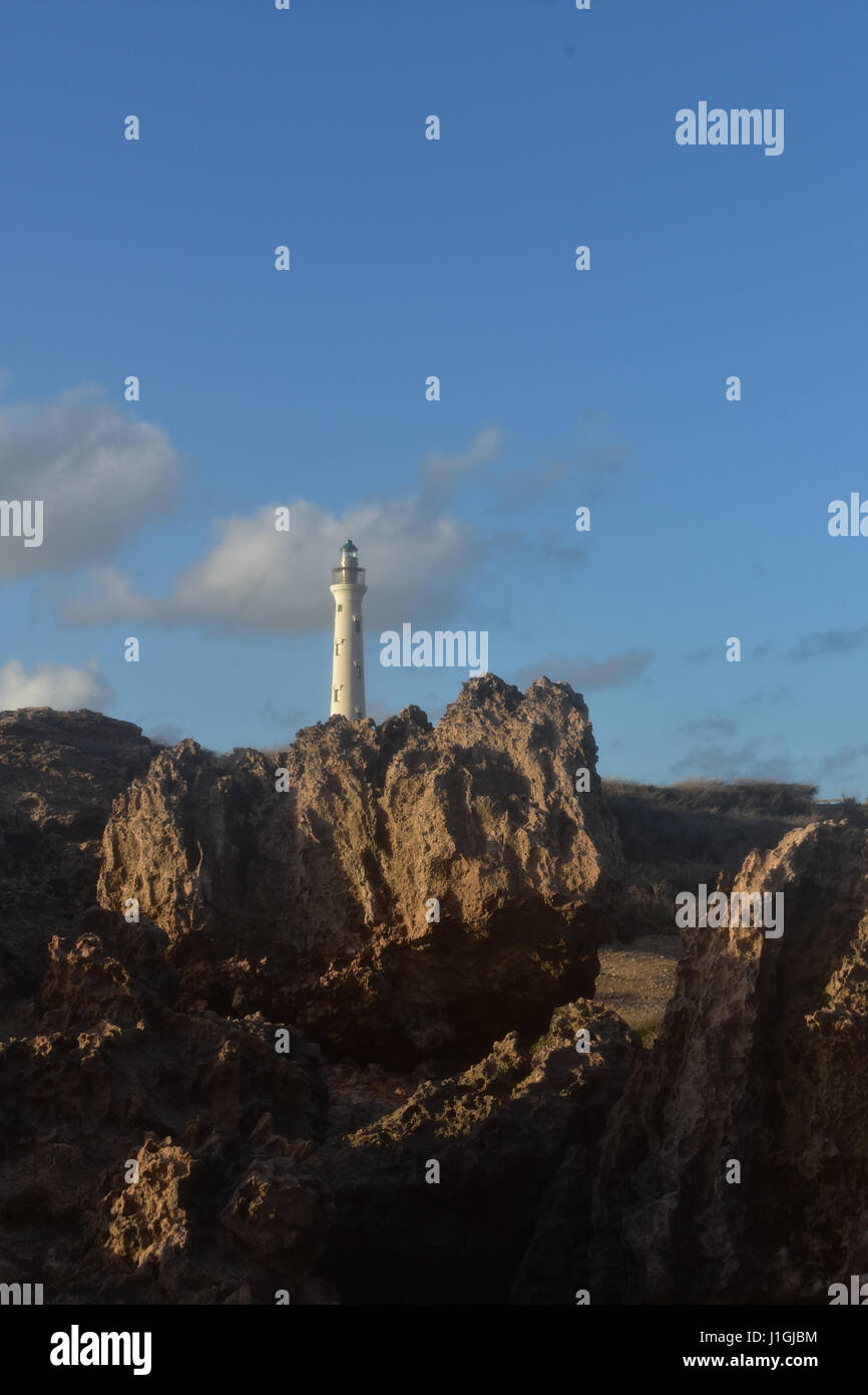 Aruba's beautiful California lighthouse with jagged lava rocks Stock ...