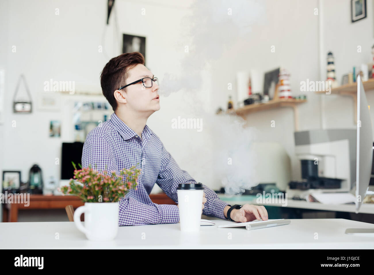 Office Smoking High Resolution Stock Photography and Images - Alamy
