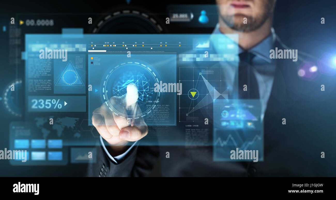 businessman touching virtual screen projection Stock Photo - Alamy