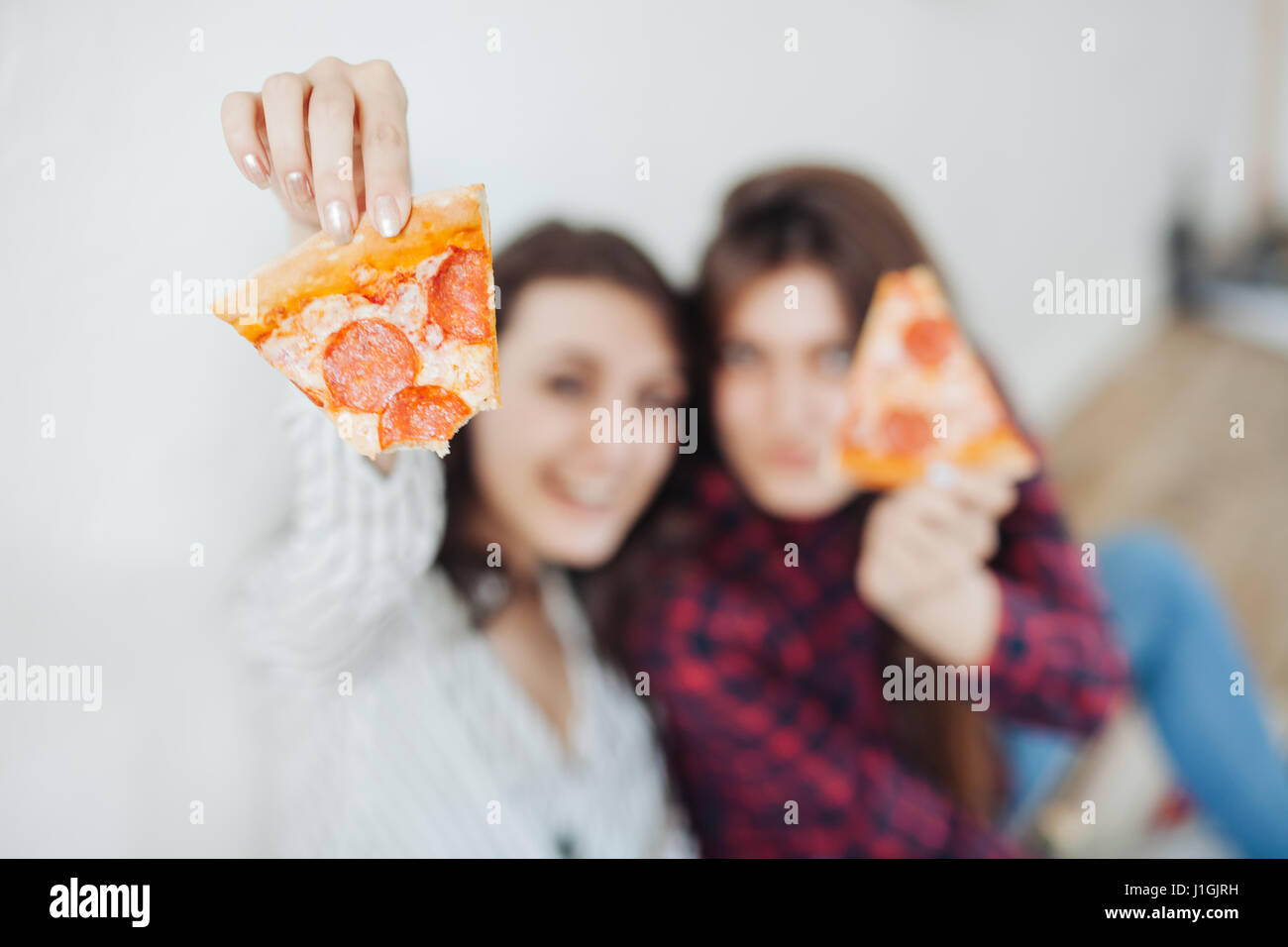 Portrait of beautiful female students organized lunch or dinner break ...