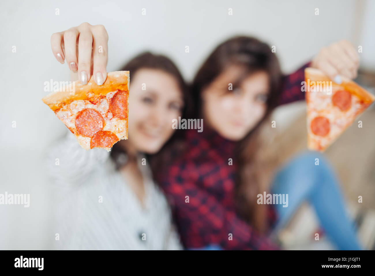Portrait of beautiful female students organized lunch or dinner break ...