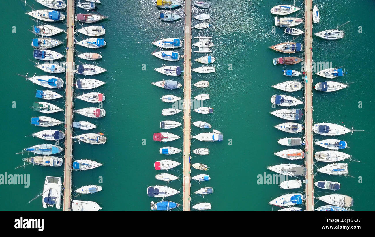 Large marina with various Yachts and boats - Aerial footage Stock Photo ...