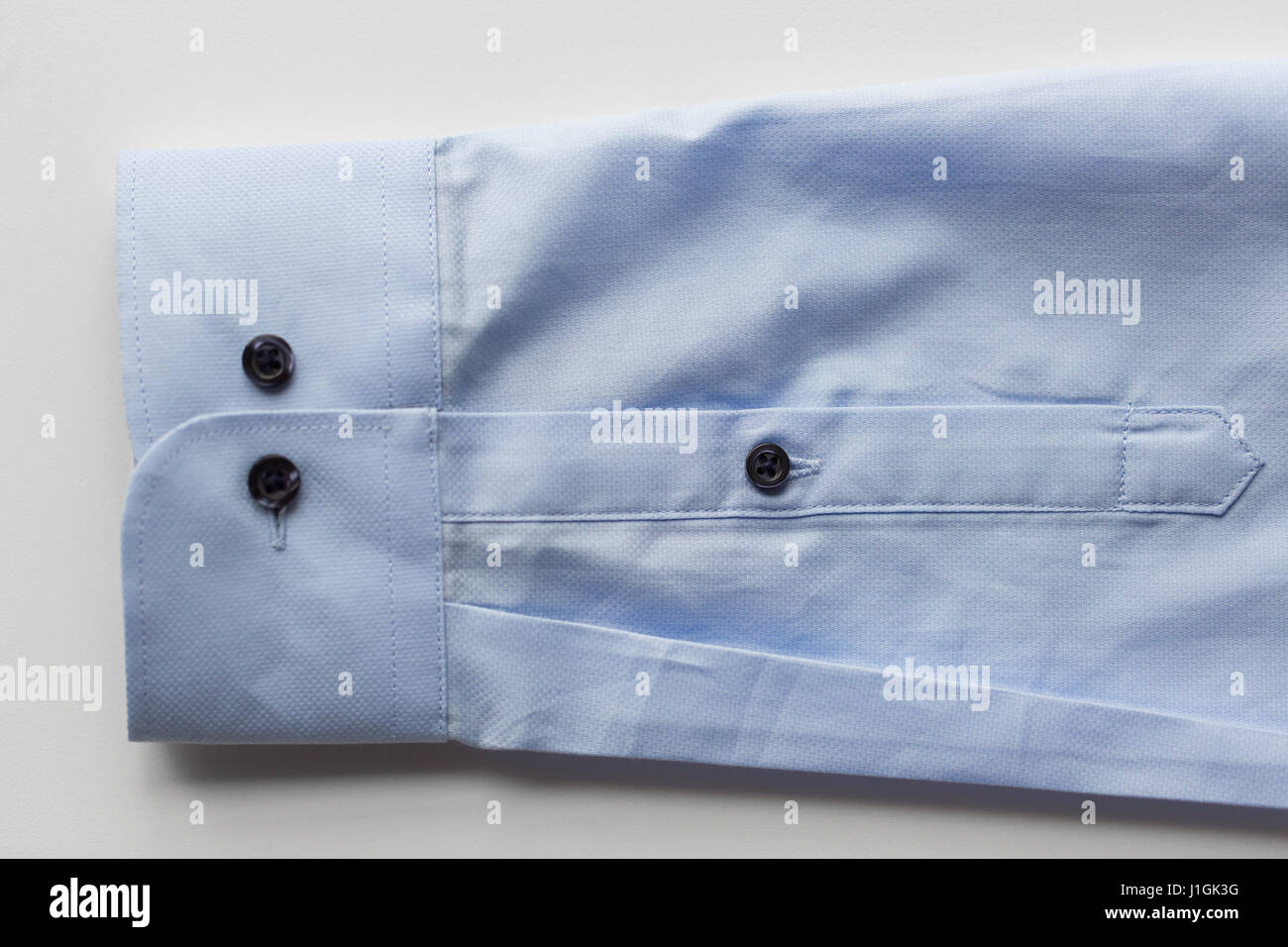 Blue cuff sleeve hi-res stock photography and images - Alamy