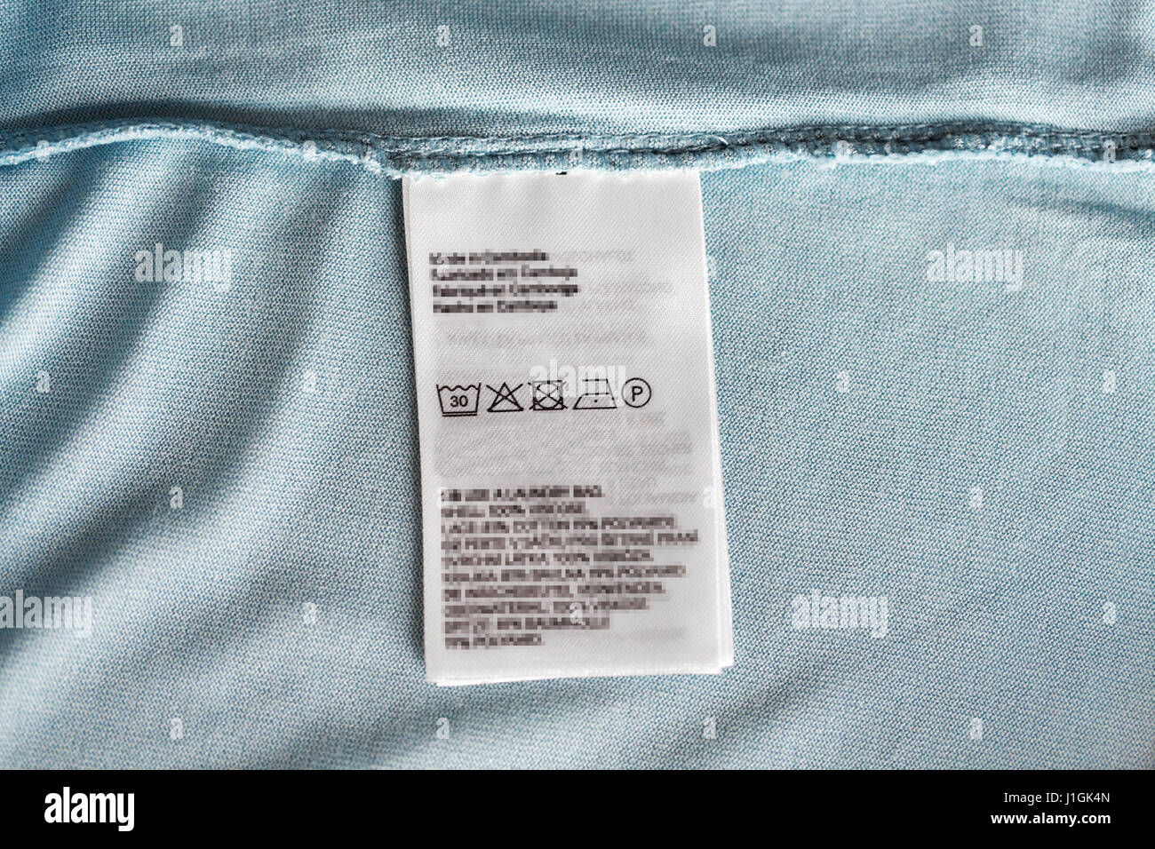 label with users manual of clothing item Stock Photo - Alamy