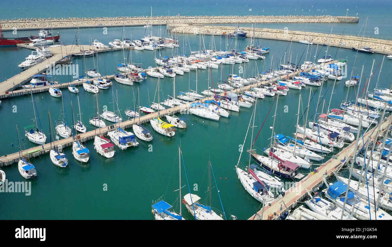 Large marina with various Yachts and boats - Aerial footage Stock Photo ...