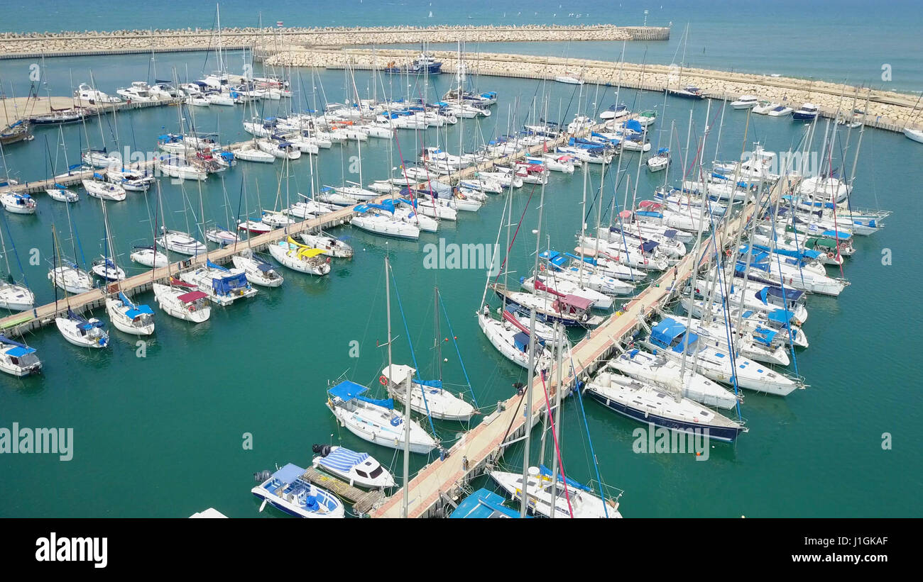 Large marina with various Yachts and boats - Aerial footage Stock Photo ...
