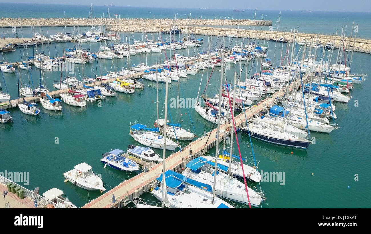 Large marina with various Yachts and boats - Aerial footage Stock Photo ...
