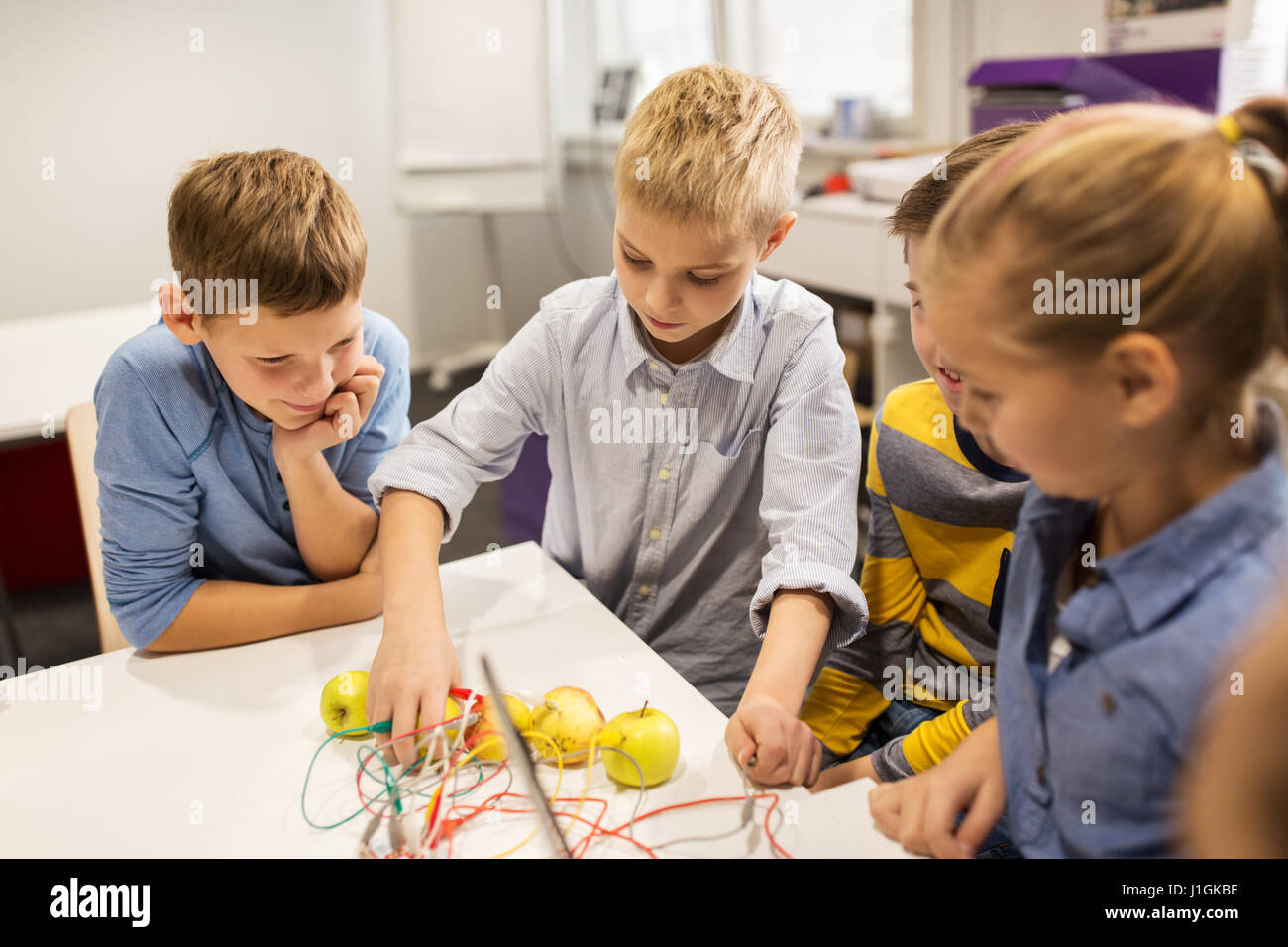 children with invention kit at robotics school Stock Photo - Alamy