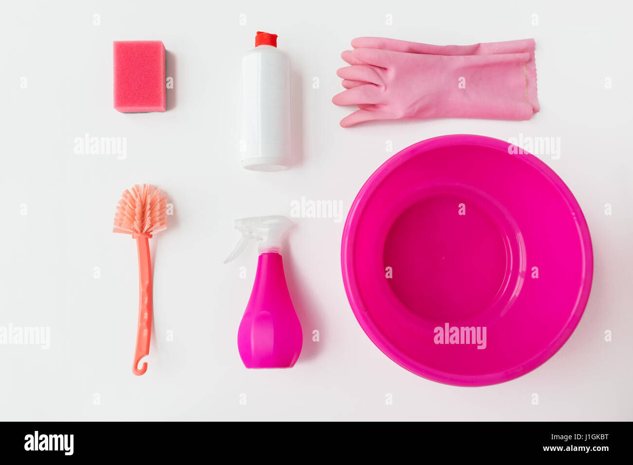 basin with cleaning stuff on white background Stock Photo - Alamy