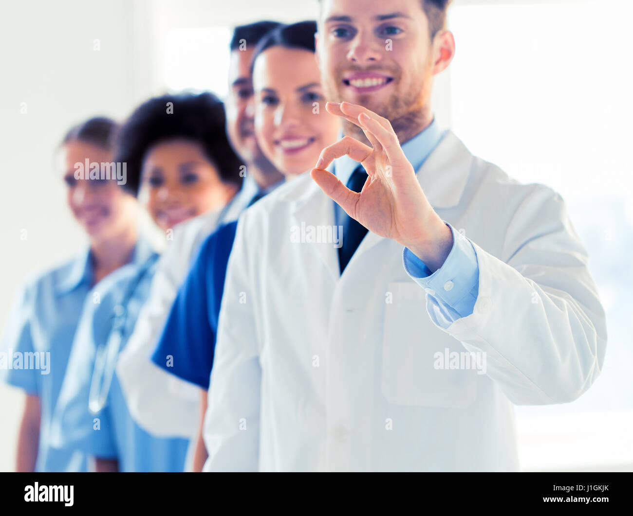 close up of doctors showing ok sign at hospital Stock Photo - Alamy