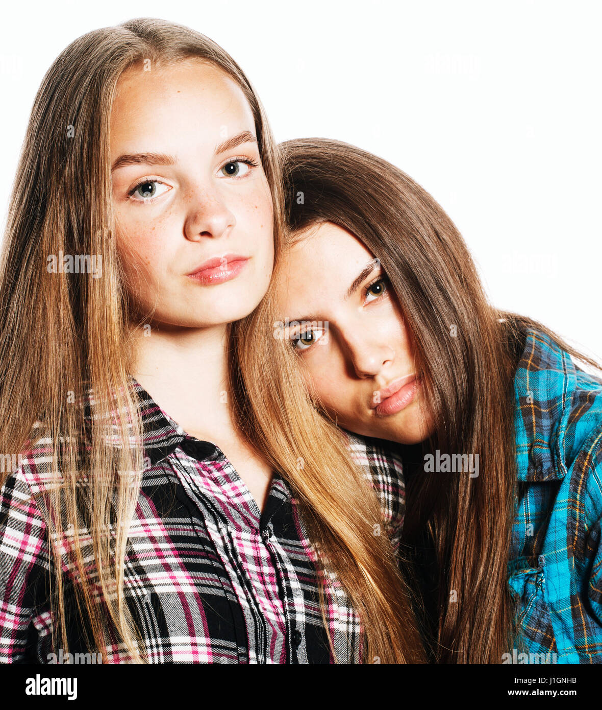 two cute teenagers having fun together isolated on white Stock Photo ...