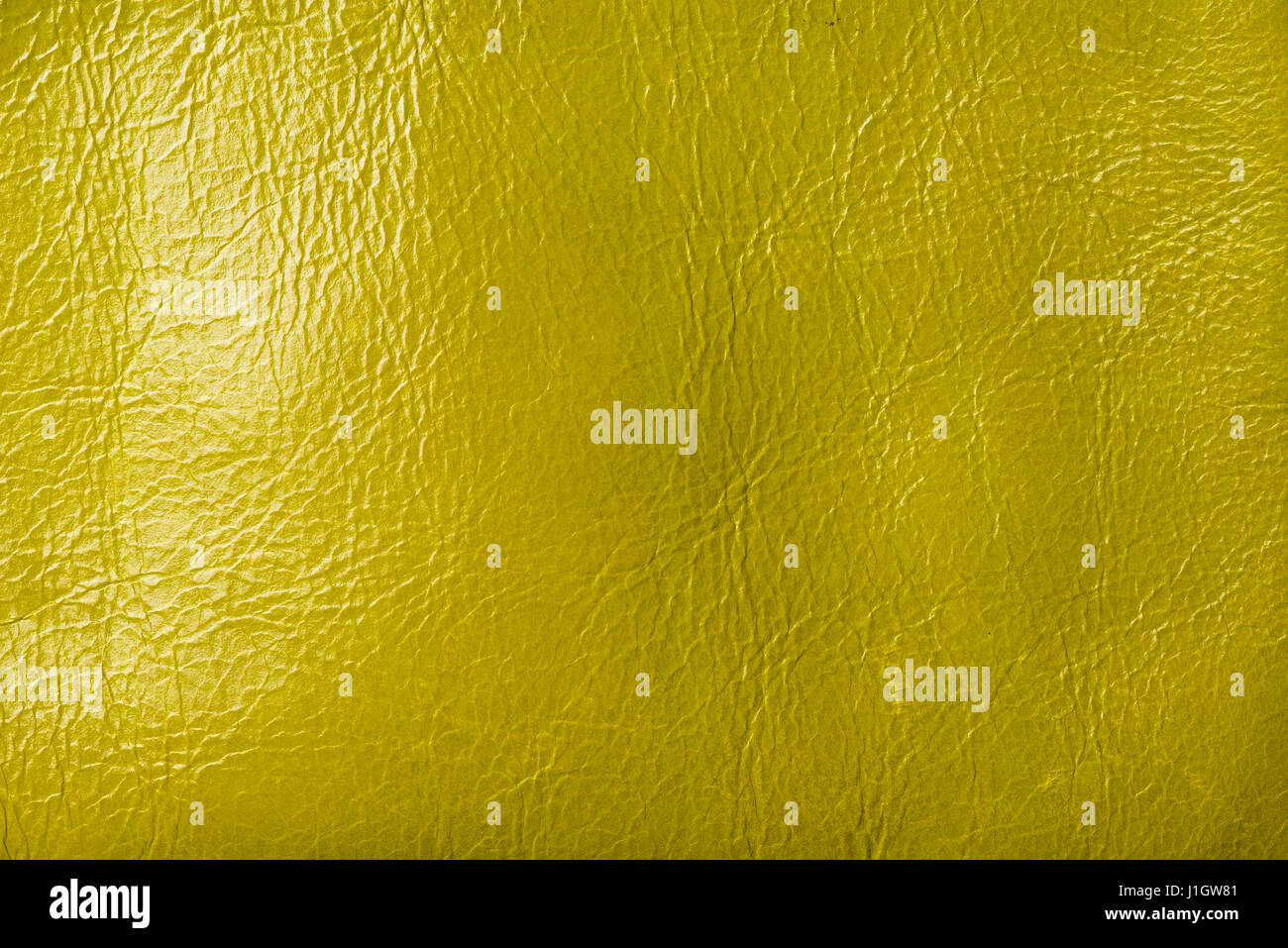 Yellow leather texture or background Stock Photo - Alamy
