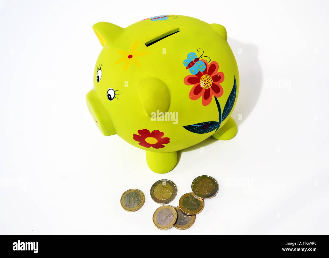 green pig money box - saving money concept Stock Photo - Alamy