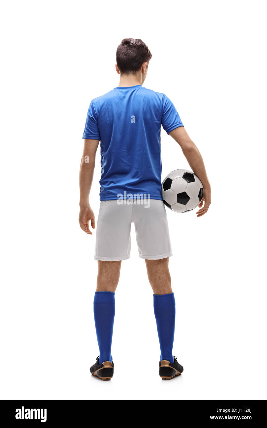 Full length rear view shot of a teenage football player isolated on ...