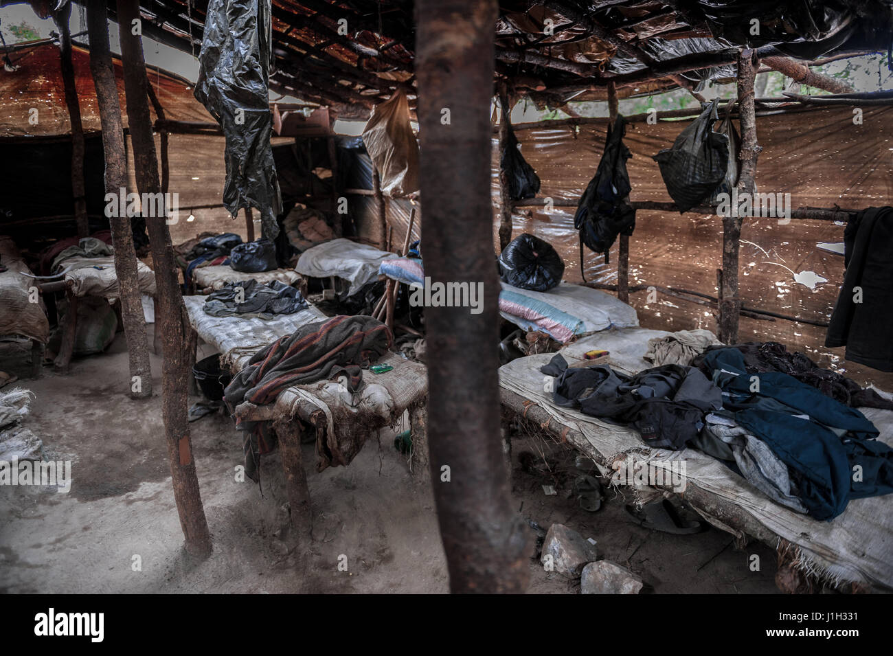 Temporary accommodation built by rose quartz artisanal miners at the ...