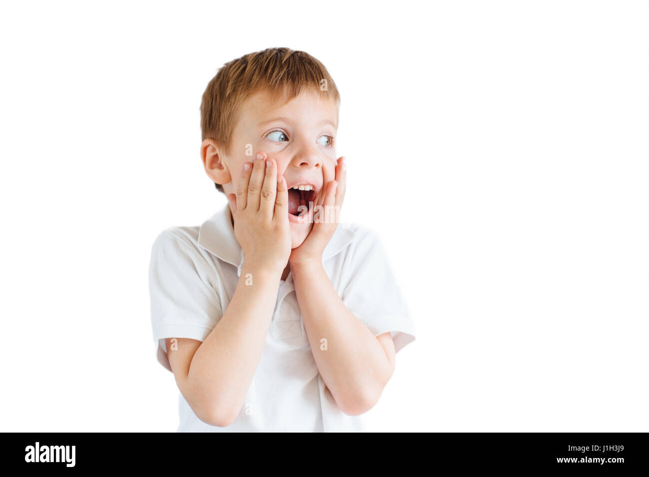 Little boy show emotions on white background Stock Photo - Alamy