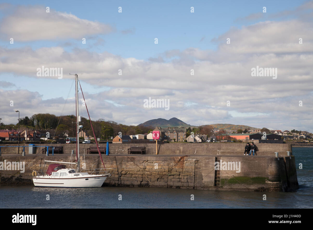 Musselburgh promenade, Edinburgh, Scotland, UK. Couple walking on ...