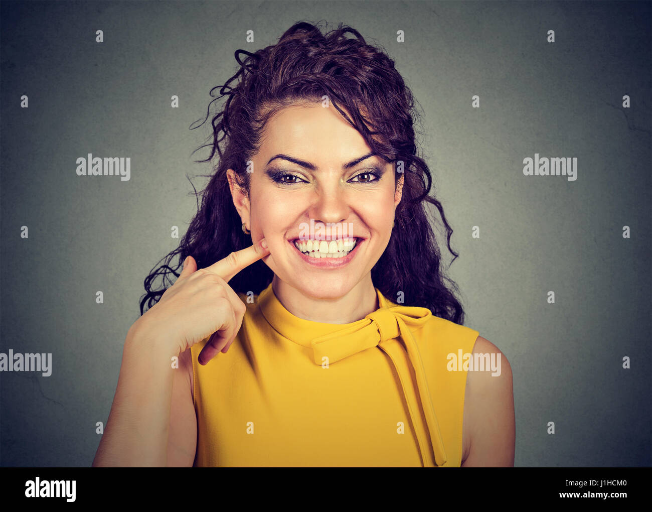 It tastes good! Happy girl Stock Photo - Alamy
