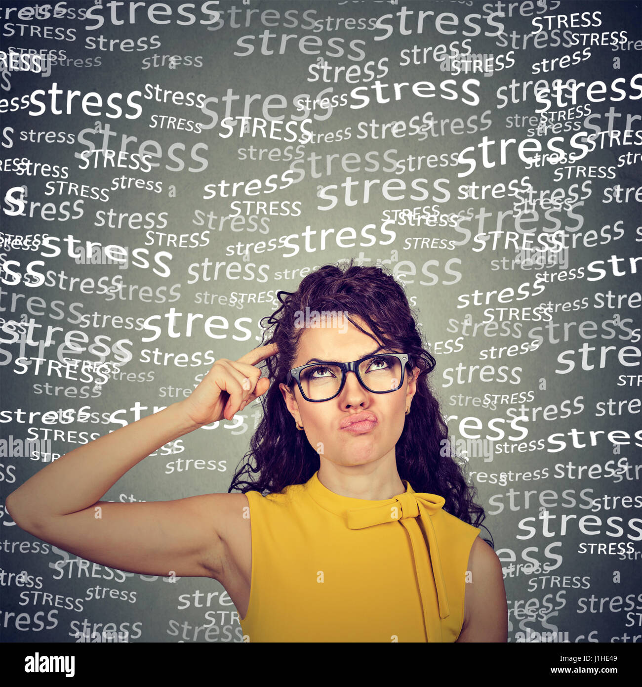 Doubtful stressed woman thinking looking up Stock Photo - Alamy