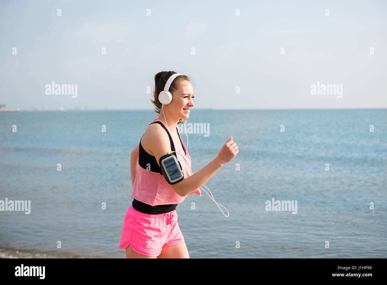 Morning running on the beach Stock Photo - Alamy