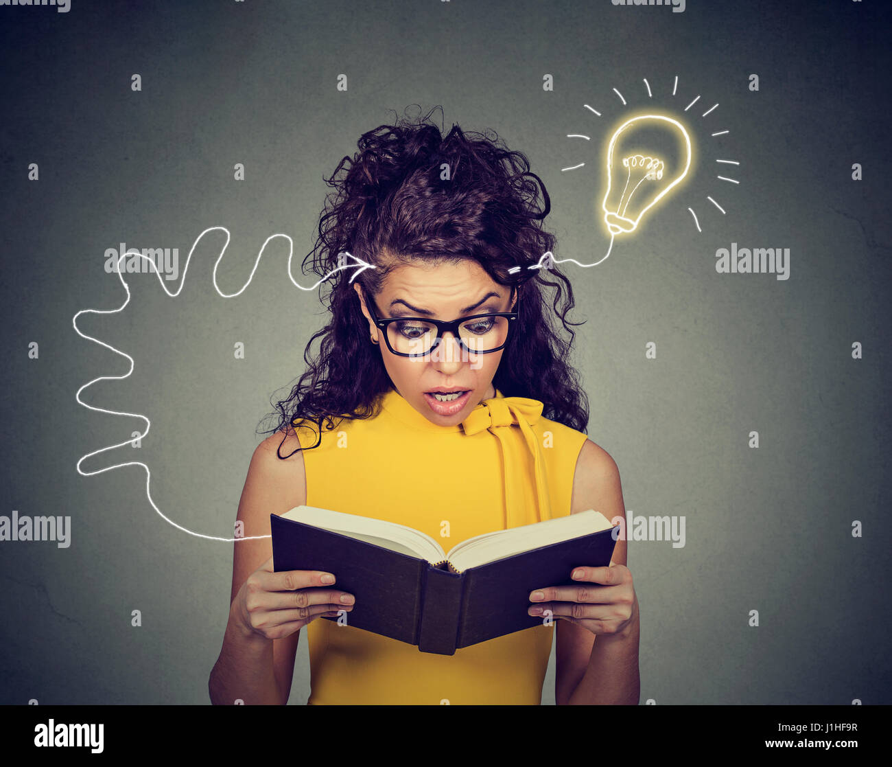 Amazed woman in eyeglasses hi-res stock photography and images - Alamy