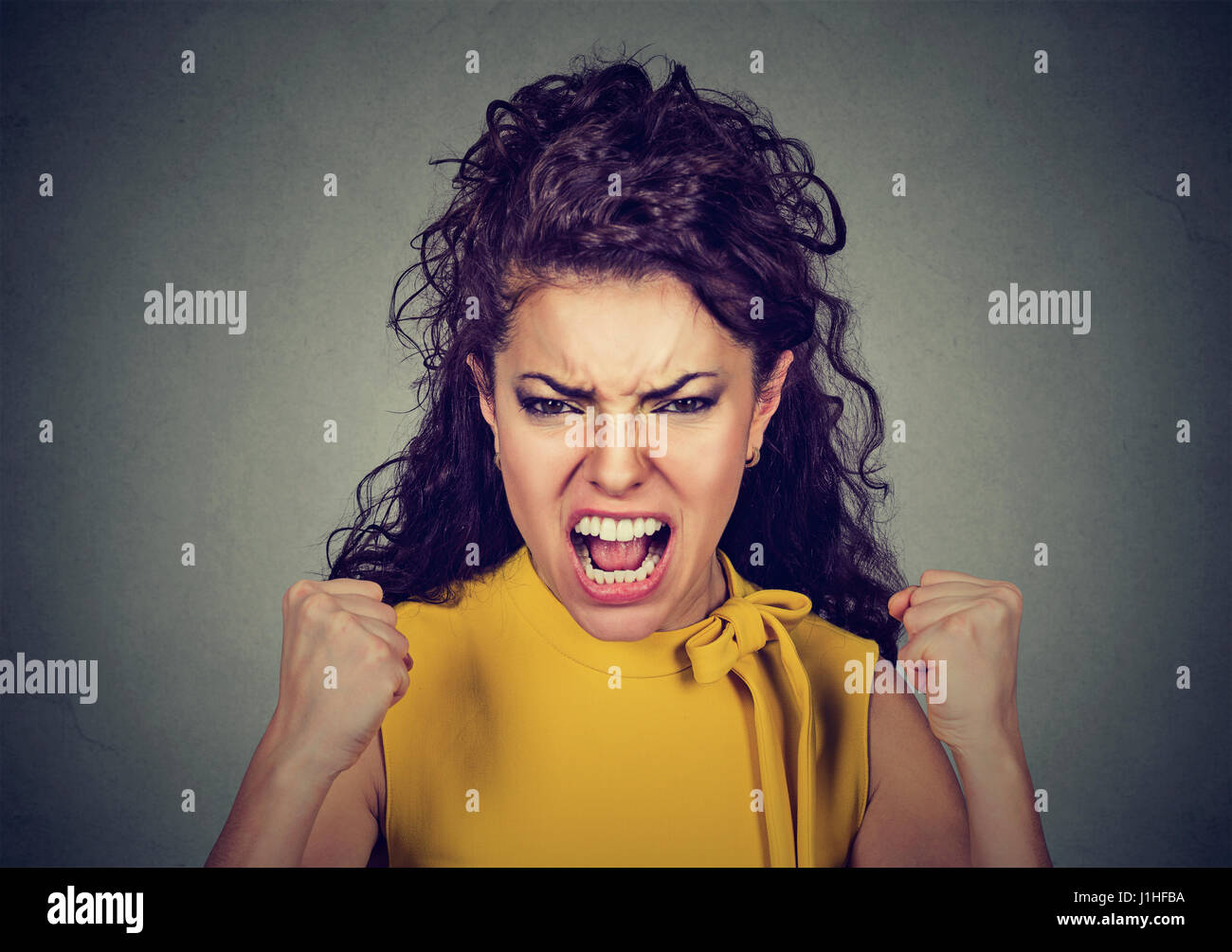 portrait of young angry woman screaming Stock Photo - Alamy