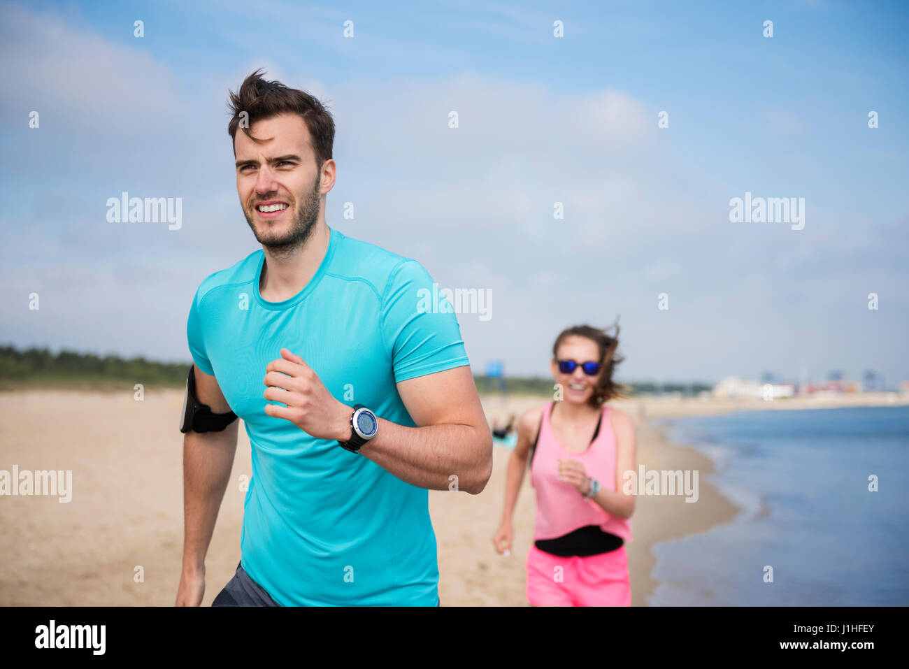 Morning cardio on the beach Stock Photo - Alamy
