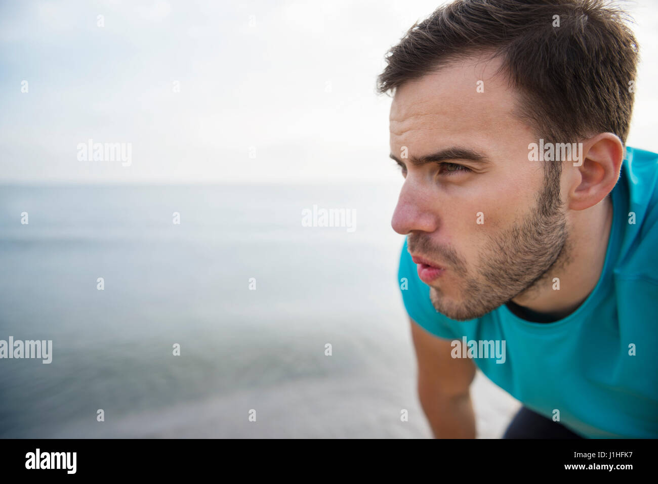 Man tired after running hi-res stock photography and images - Alamy