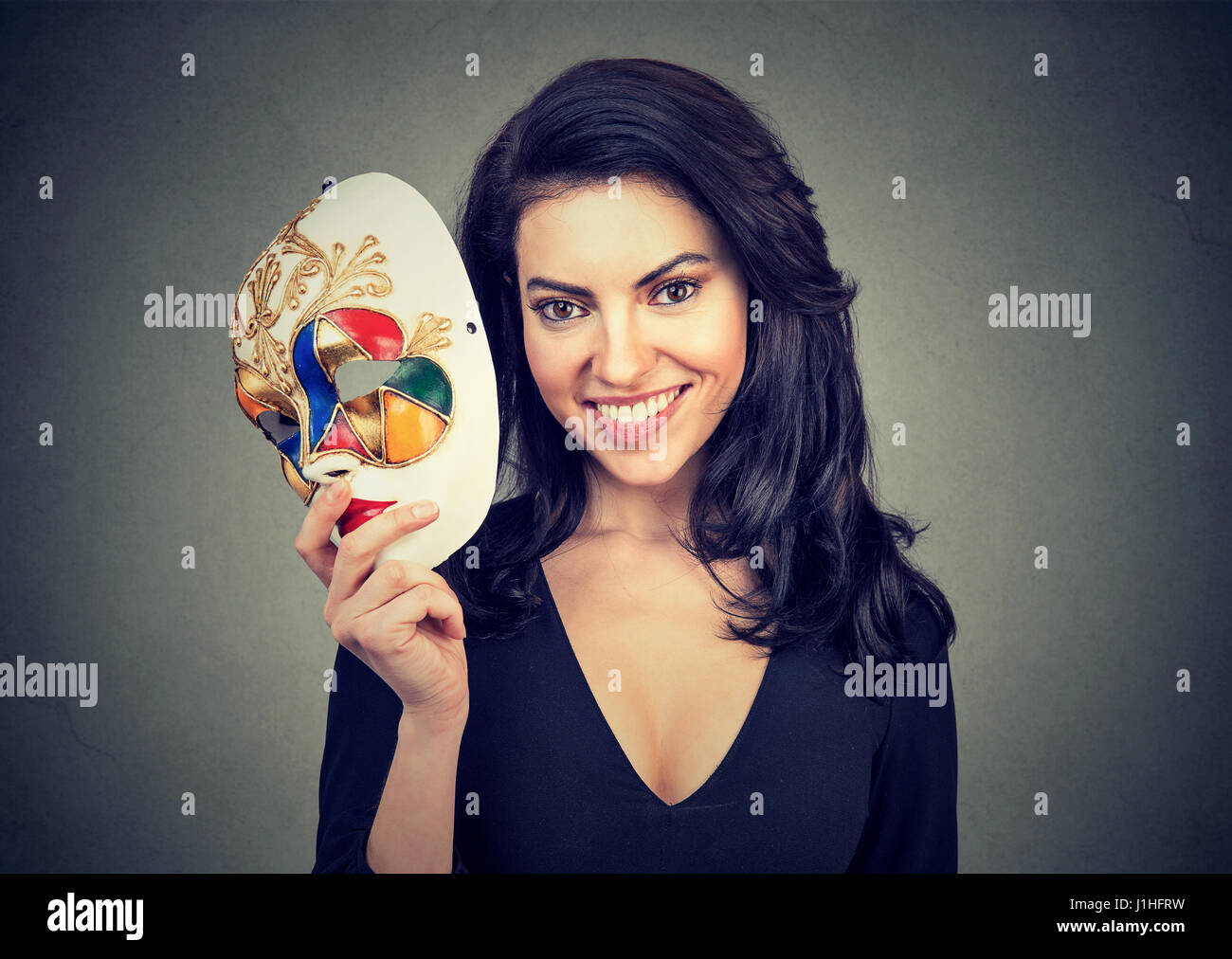 Smiling masquerade hi-res stock photography and images - Alamy