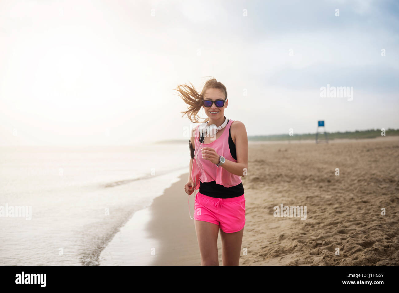 Jogging in the strong wind Stock Photo - Alamy