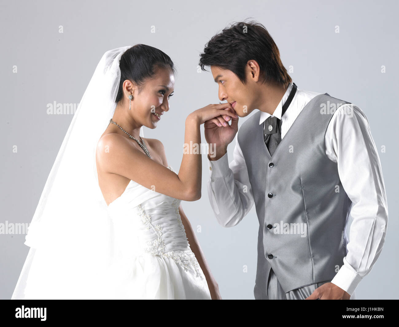 Wedding hand up man kissing hi-res stock photography and images - Alamy