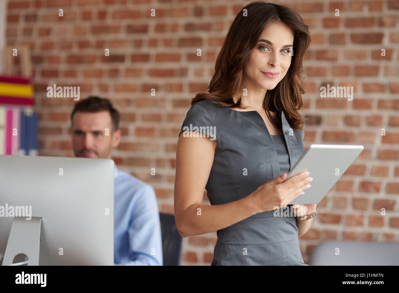 Browsing man woman tablet hi-res stock photography and images - Alamy