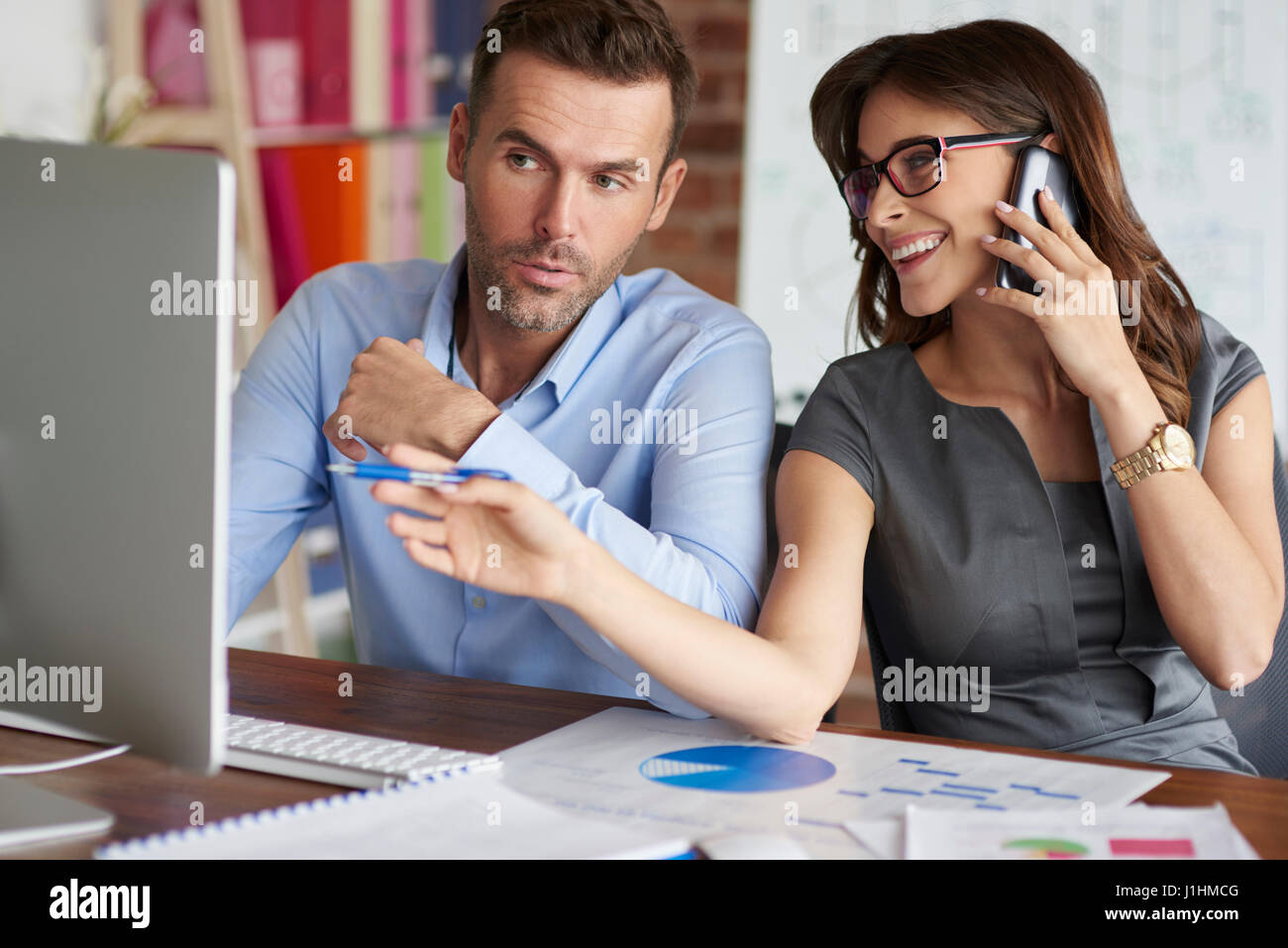 Good advice from the colleague Stock Photo - Alamy