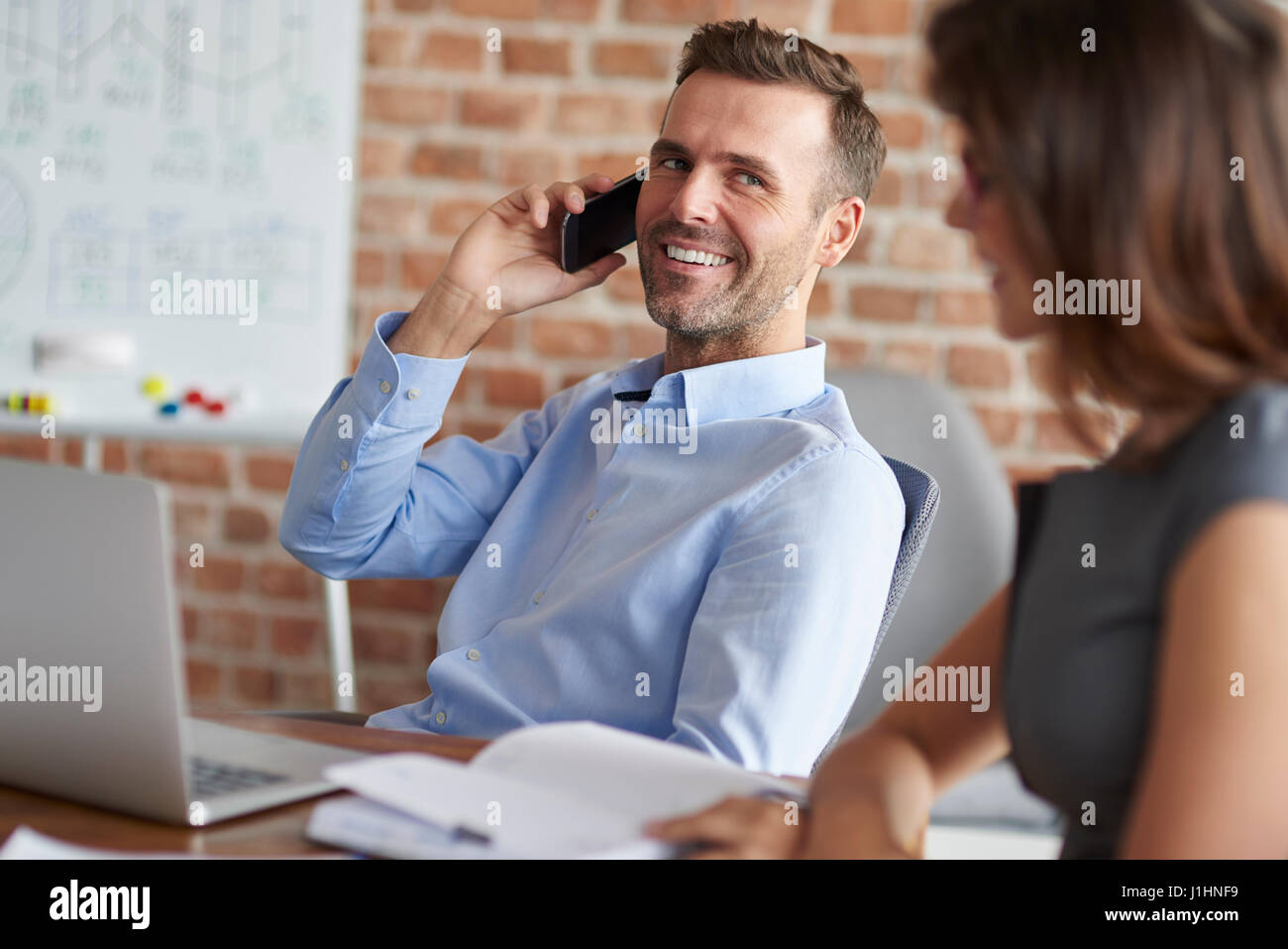 On phone businessman analyzing digital hi-res stock photography and ...