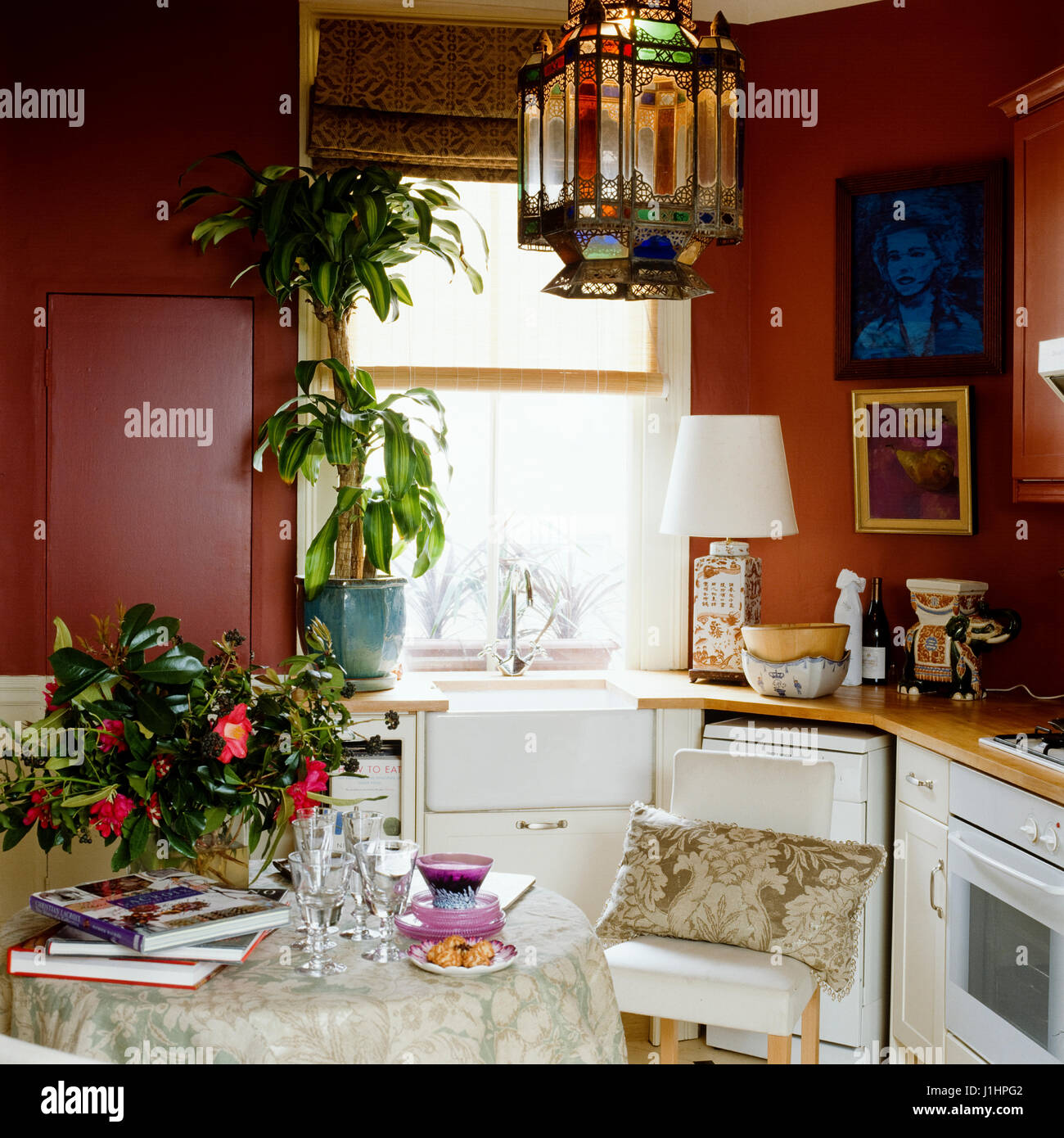 Dining table in kitchen Stock Photo - Alamy