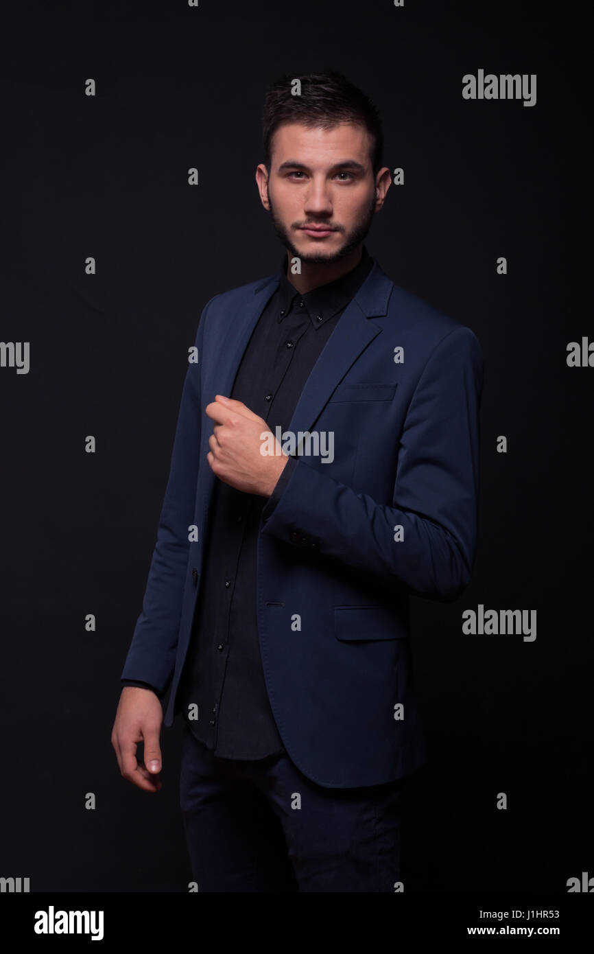 young adult man, 20s model looking at camera, good looking, looking ...