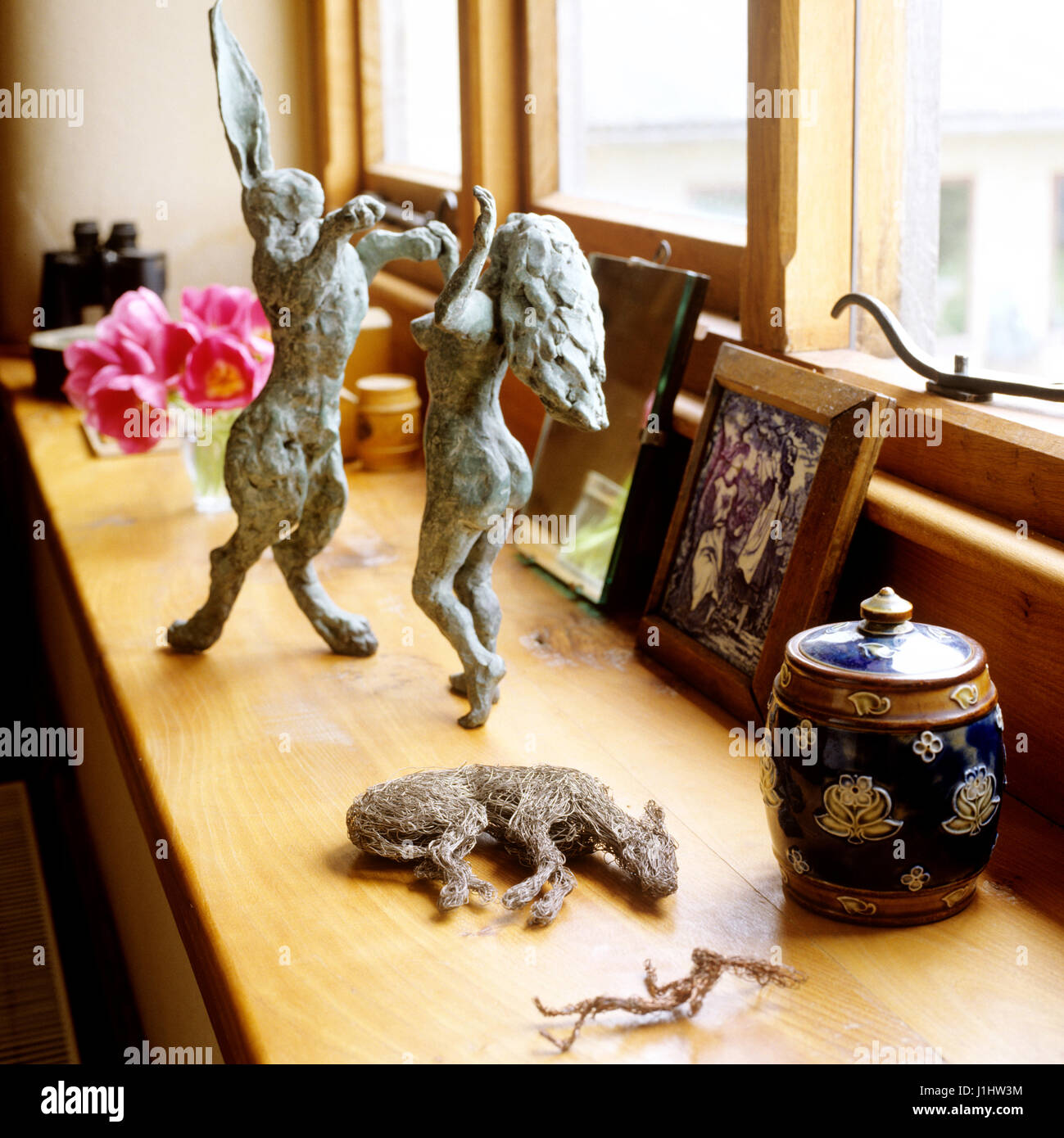 Surreal sculpture of woman dancing with rabbit Stock Photo - Alamy