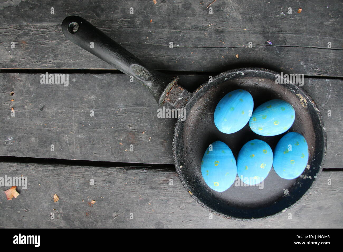Easter eggs in a frying pan Stock Photo - Alamy
