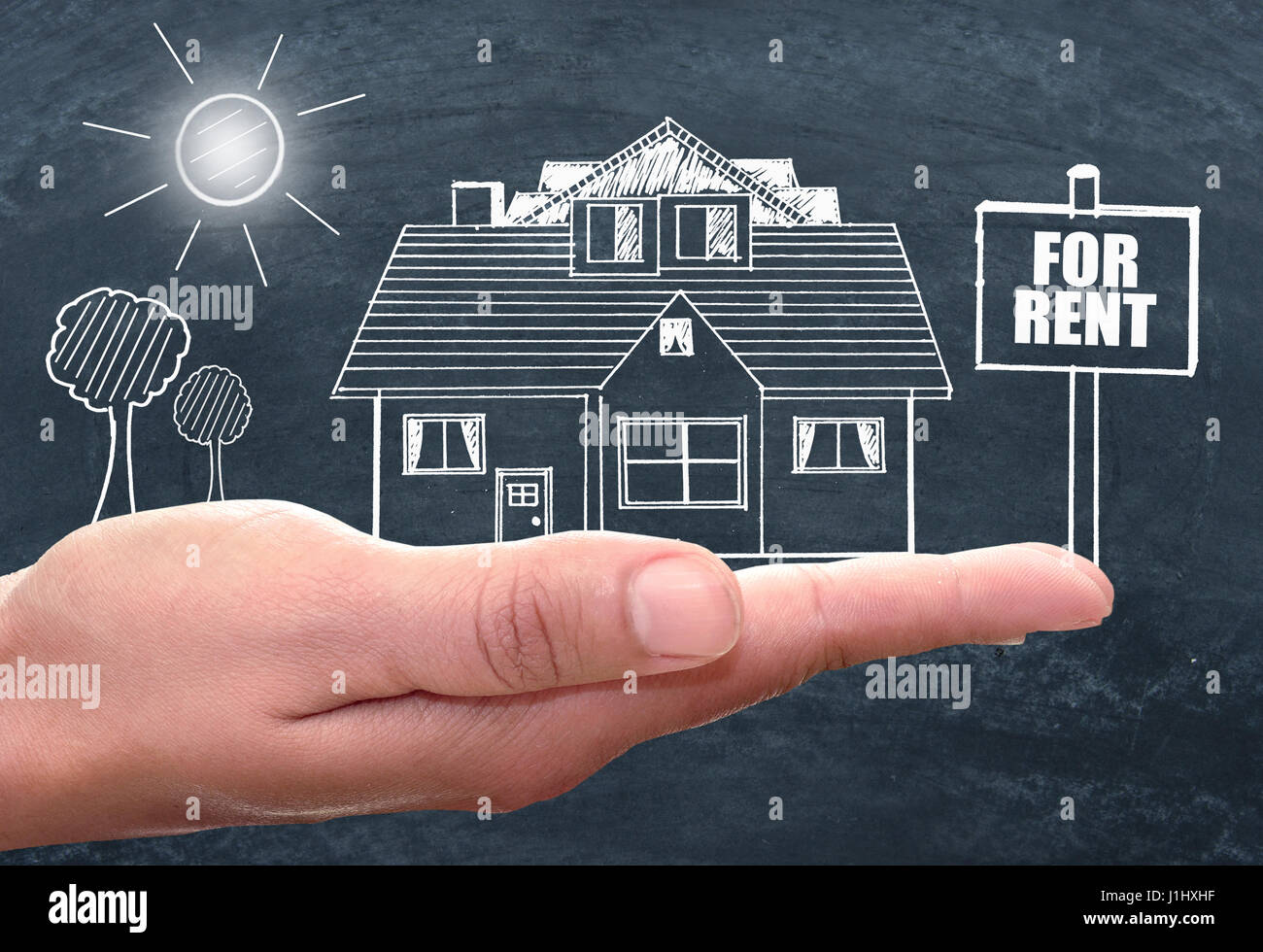 Chalkboard sketch of a home in a hand with a for rent sign Stock Photo ...