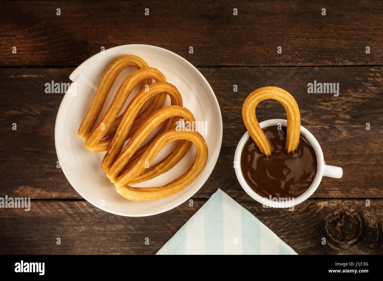 Photo of churros con chocolate, traditional Spanish dessert Stock Photo ...
