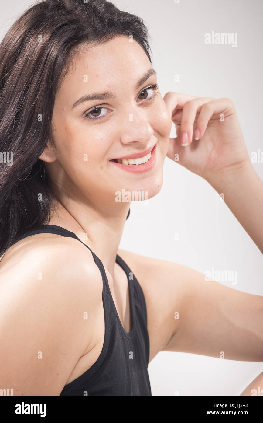 one young woman head face, closeup smiling, swimsuit, swim suit, white ...
