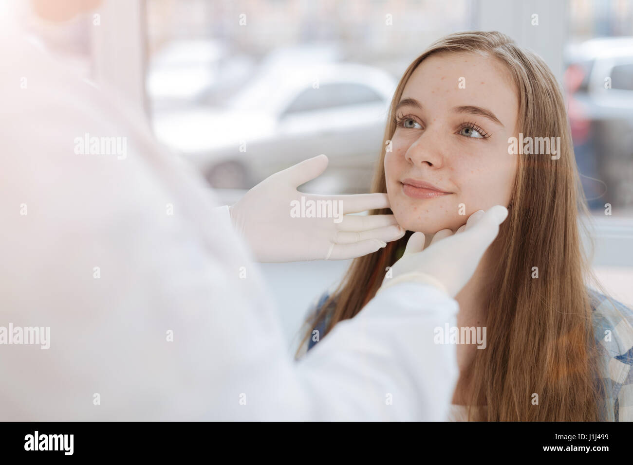 Dermatology patient in treatment hi-res stock photography and images ...