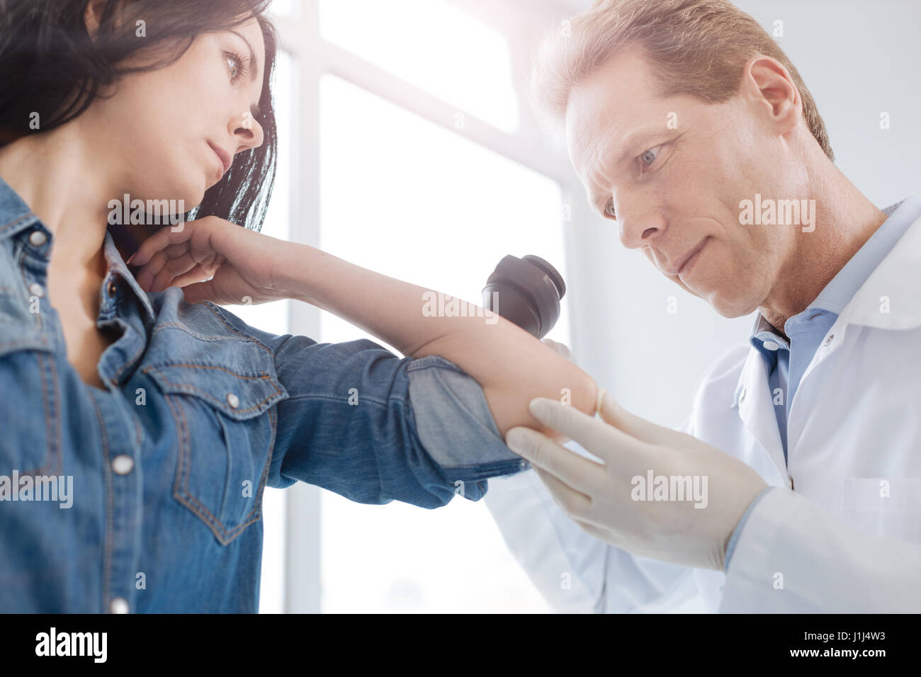Skin cancer examination hi-res stock photography and images - Alamy