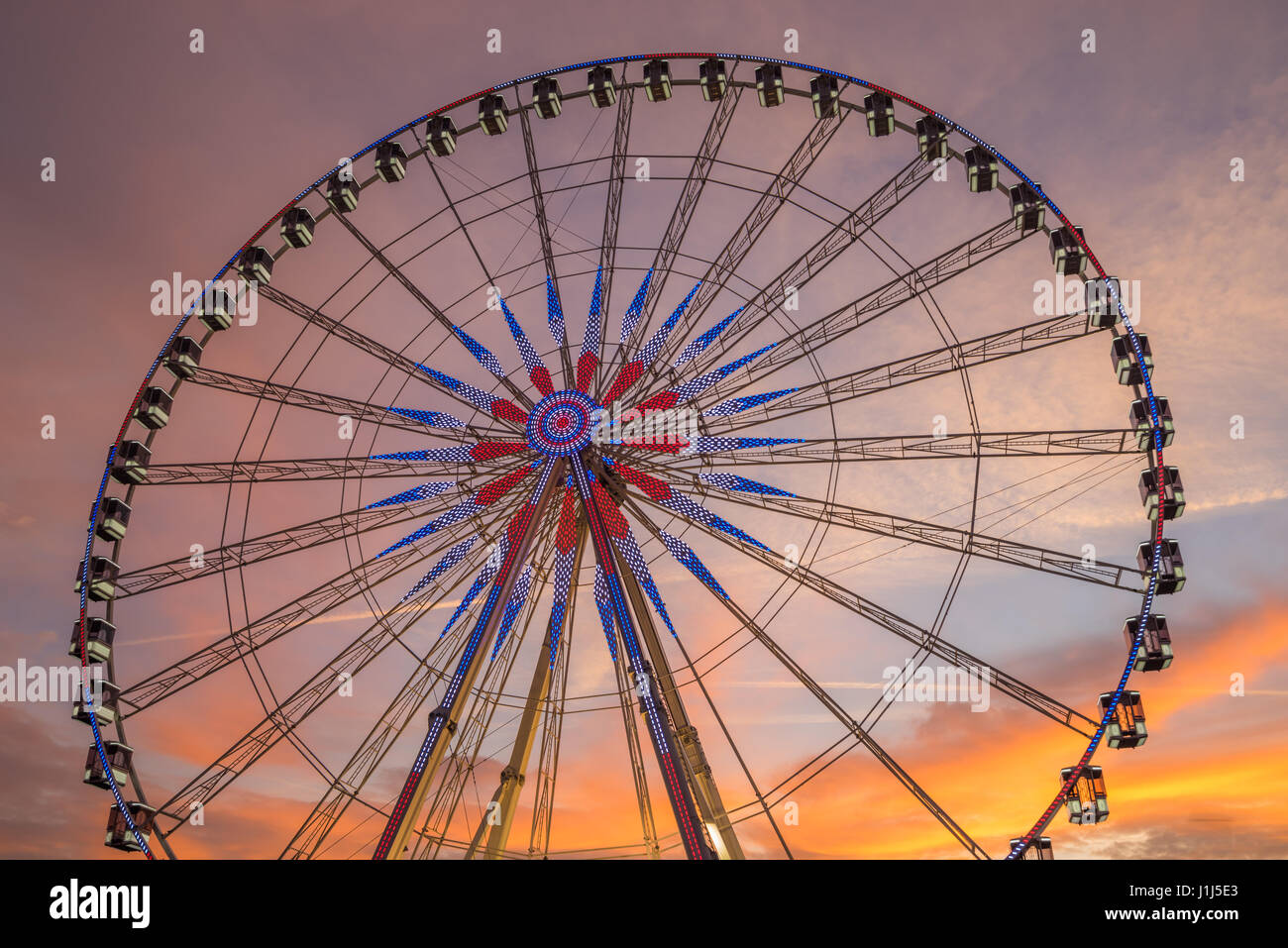 Place de la Concorde at sunset. Ferris wheel and Egyptian obelisk ...