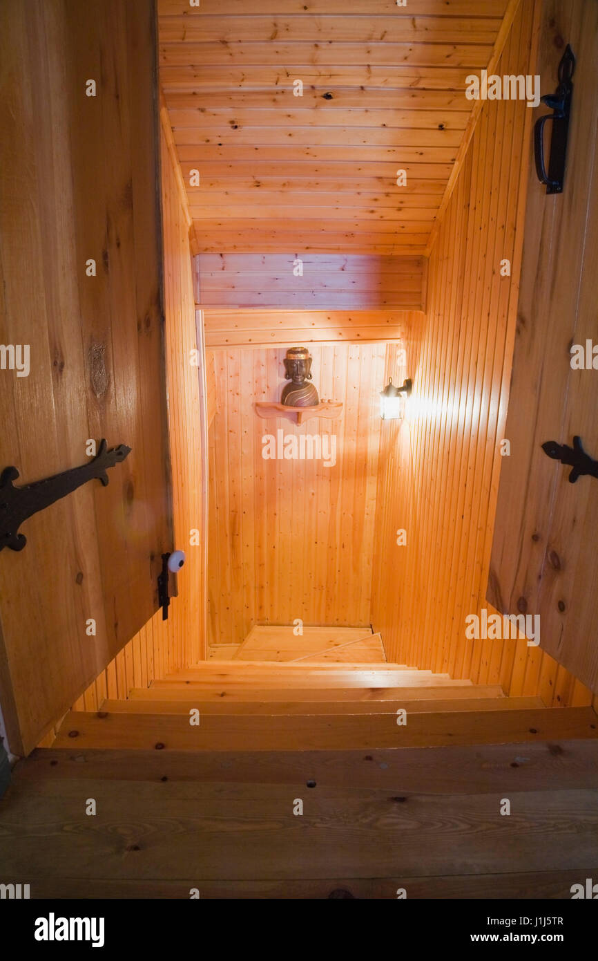 Pinewood staircase leading to the basement in a 1978 reproduction of an ...