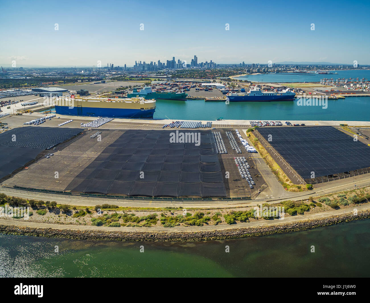 Large car carrier and other industrial ships docked at Port Melbourne ...