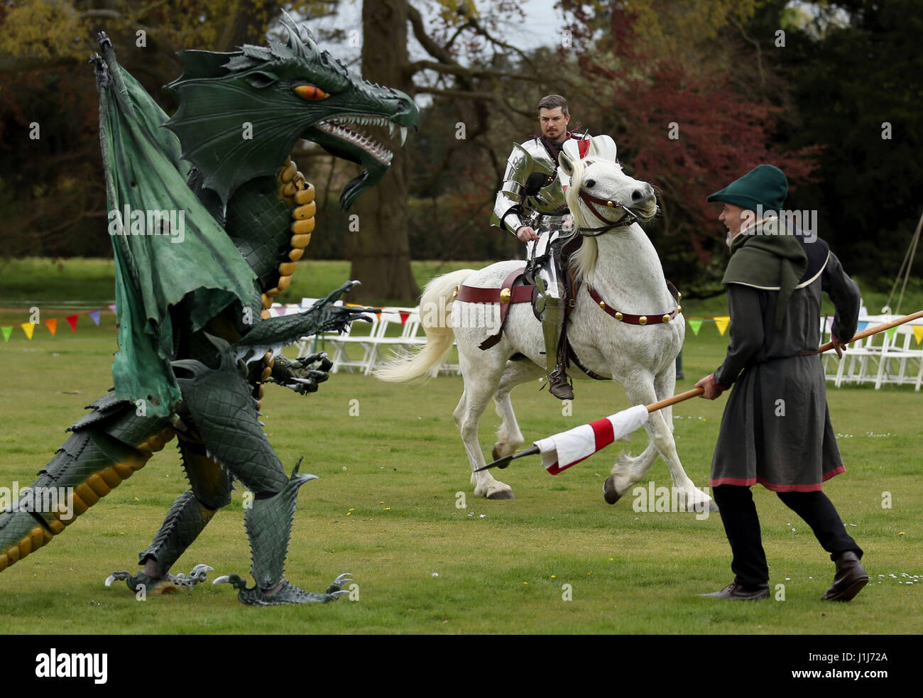 Performers act out the legend of St George and the dragon during a ...
