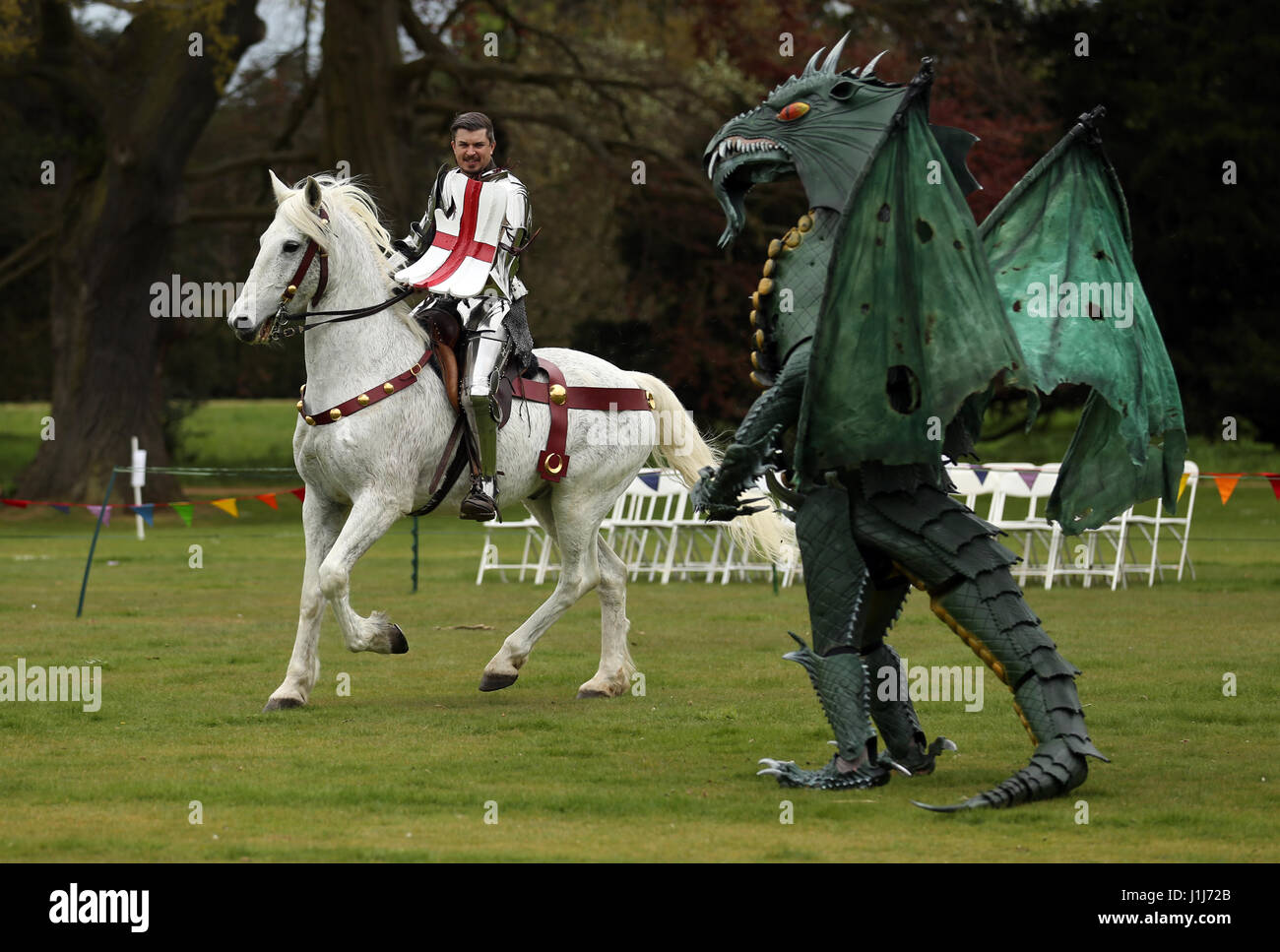 Performers act out the legend of St George and the dragon during a ...
